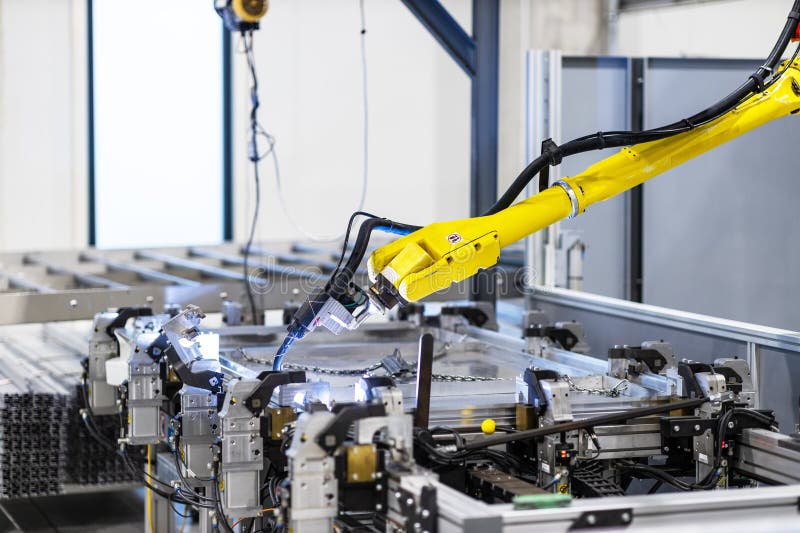 Industrial Robot or Robotic Arm in Industrial Manufacturing Stock Photo ...