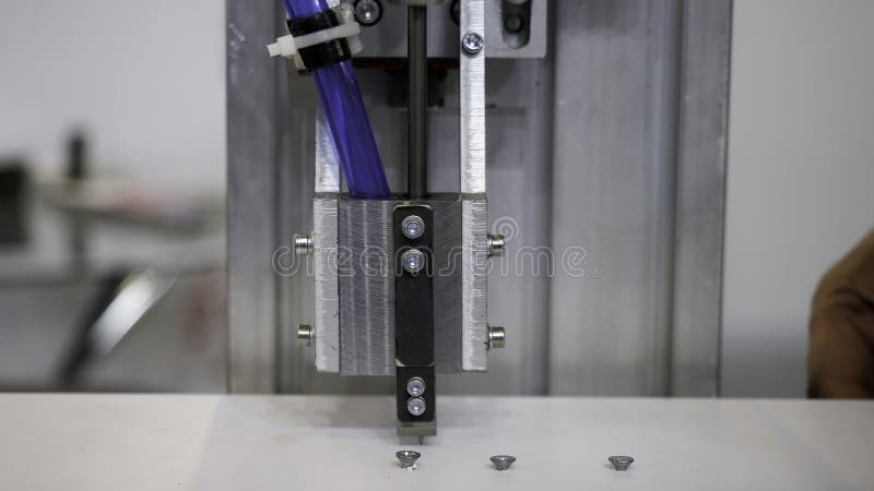 Industrial Robot Using Automatic Screwdriver on Wooden Product. Media ...