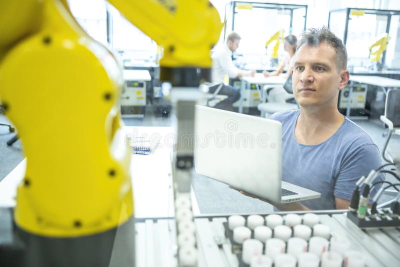 Industrial Robots Development Stock Photo - Image of automate ...
