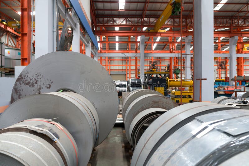 An Industrial Setting Filled with Neatly Steel Sheet Roll Stack ...