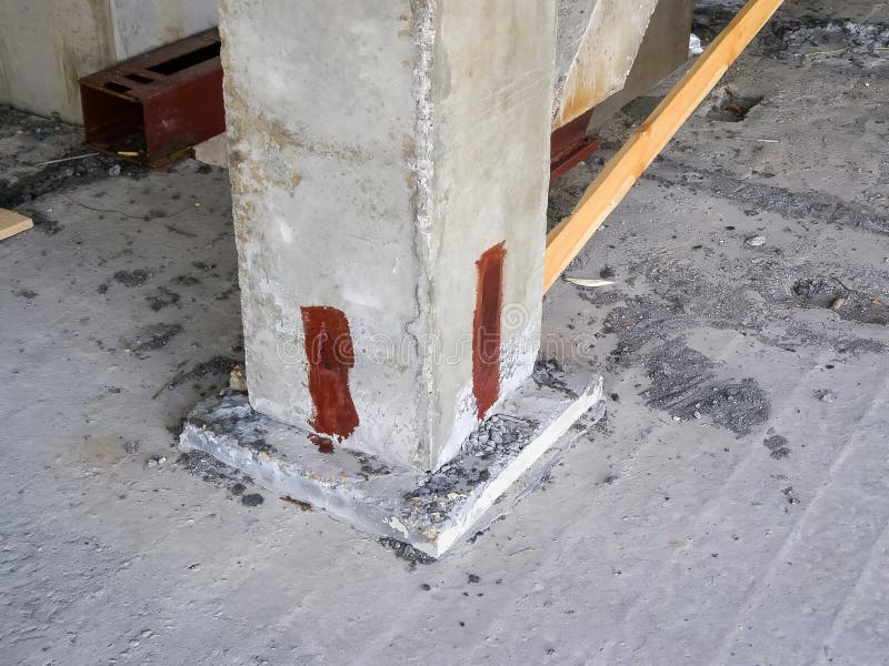 A Robust Concrete Pillar Stands, Its Base Firmly Grounded, in an ...