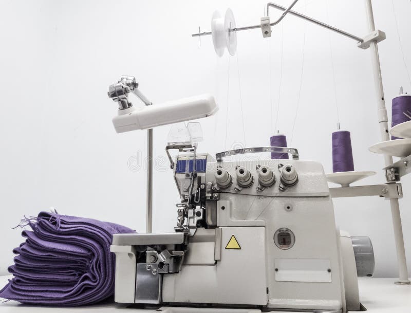 Industrial Sewing Machine Overlock with Lilac Threads Stock Image ...