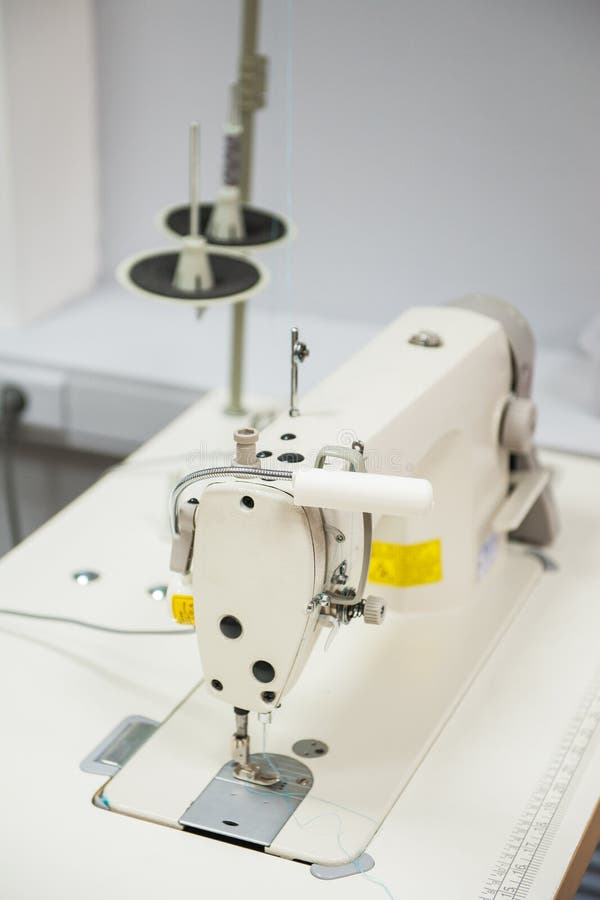 Industrial sewing machine stock image. Image of blue - 148153123