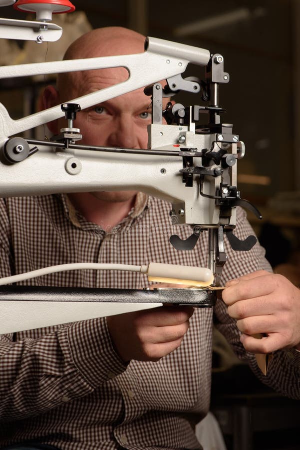 Industrial Sewing Machine in Workshop of Shoemaker. Bootmaker Setting ...