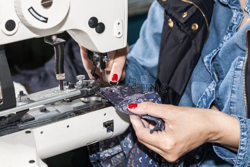 Industrial Sewing Machines with Sewing Machine Operator Stock Photo ...