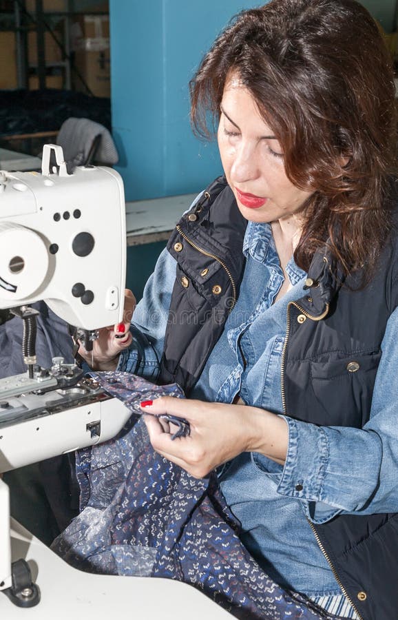 Industrial Sewing Machines with Sewing Machine Operator Stock Photo ...