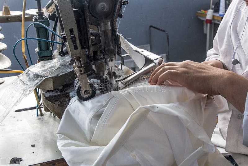 Industrial Sewing Machines with Sewing Machine Operator Stock Photo ...