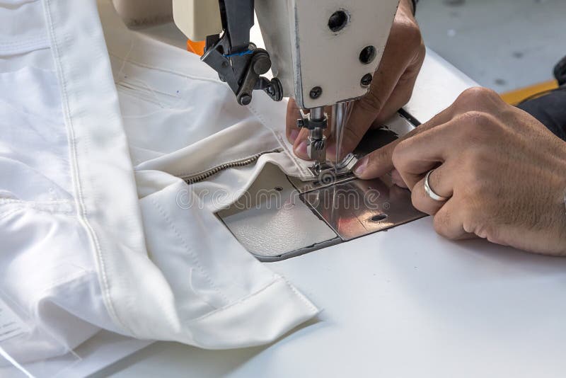 Industrial Sewing Machines with Sewing Machine Operator Stock Image ...