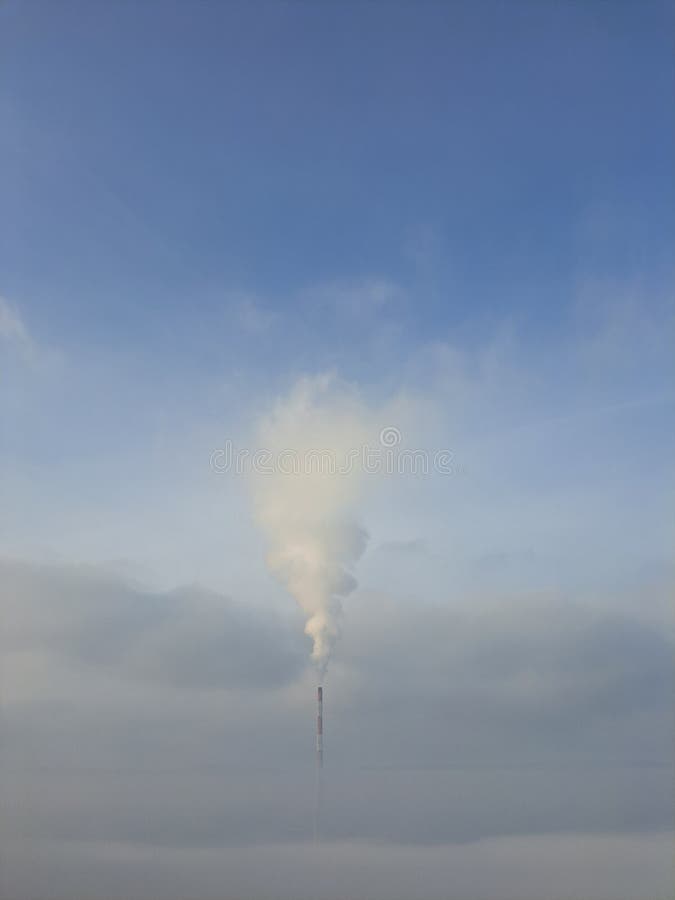 Industrial Smoke Pipe in the Clouds and Fog Stock Image - Image of dusk ...