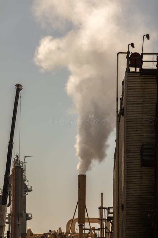 Industrial Smoke Stack Emitting Steam Stock Image - Image of daytime ...