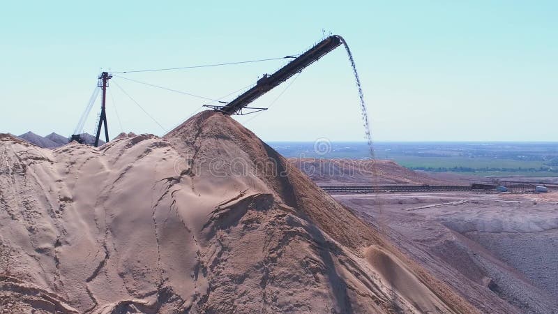An Industrial Spreader in the Process of Work. the Process of Pouring ...