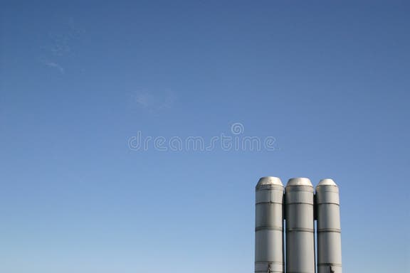 Industrial Stacks Blue Sky stock image. Image of energy - 502459