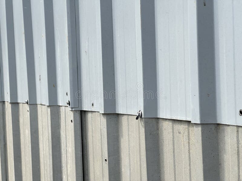 Industrial Steel Sheet with a Gray Wall Stock Image - Image of urban ...