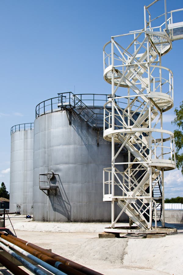 Industrial Storage Tanks stock photo. Image of ladder - 32462050
