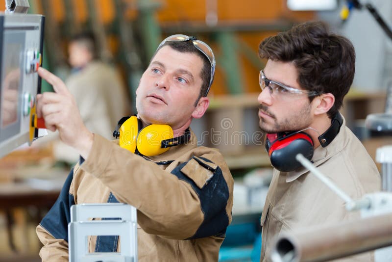 Industrial Supervisor Setting Machine Stock Photo - Image of shavings ...
