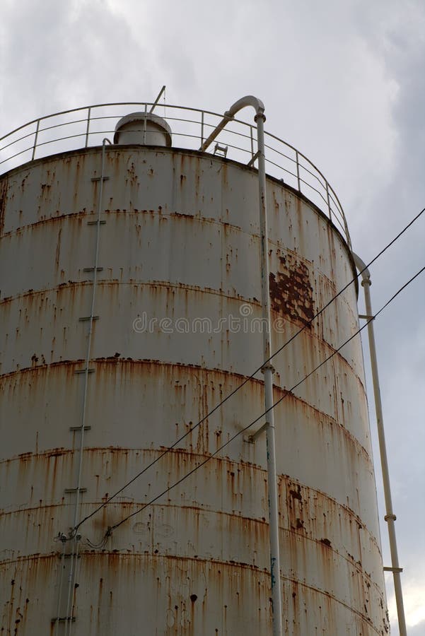 Industrial Tank with Pipes and Rust Stock Image - Image of pipes ...