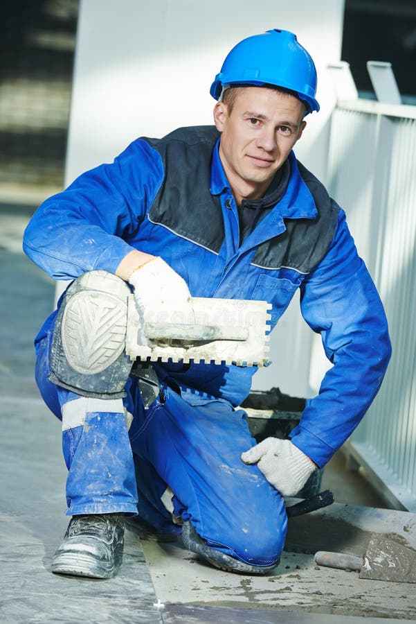 Industrial Tiler Builder Worker Fitting Floor Stock Photo - Image of ...