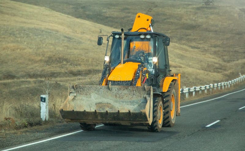 Industrial Tractor on the Highway Road. Armenia Stock Image - Image of ...