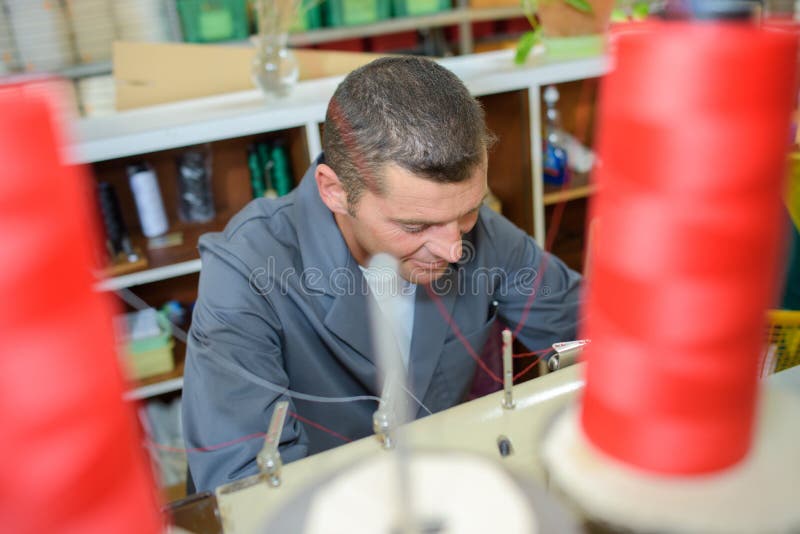 Industrial weaver at work stock image. Image of profession - 121235869