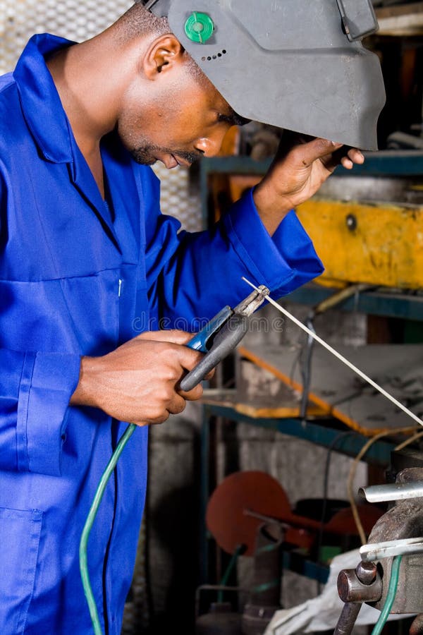 Industrial welder stock photo. Image of helmet, blue, mainterance - 7671430