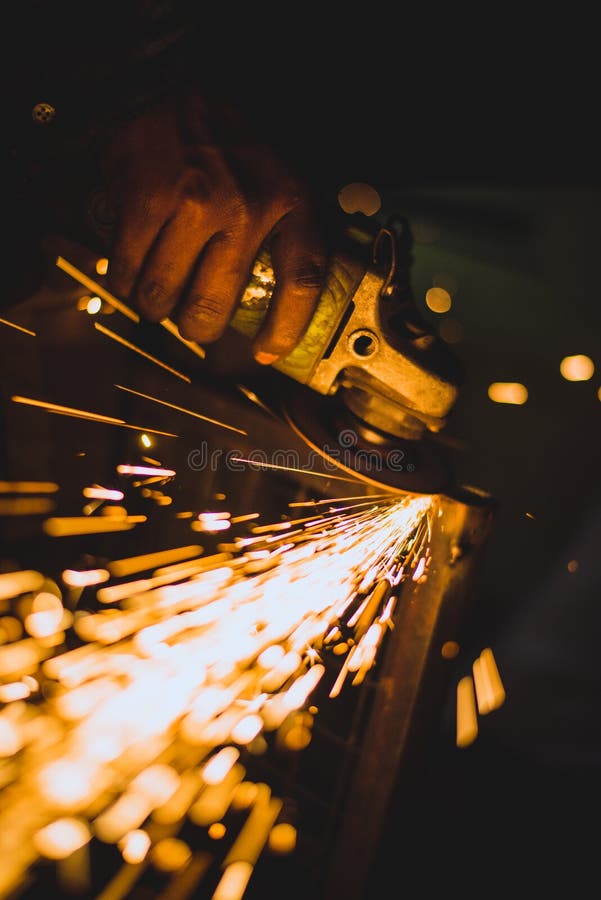 Worker Using a Grinder on a Metal Stock Image - Image of metal, cutting ...