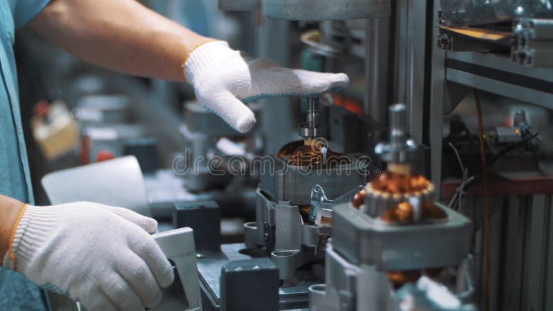 The Worker is Assembling the Machine, Close-up. CNC Assembly Process ...