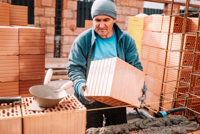 Industrial Worker, Bricklayer and Mason Working with Bricks Stock Image ...