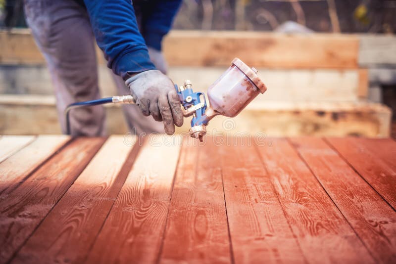 Industrial Worker, Construction Worker Painting with Spray Gun on Site ...