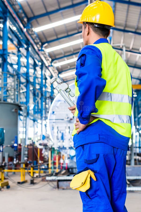 Worker in Factory at Industrial Metal Cutting Machine Stock Image ...