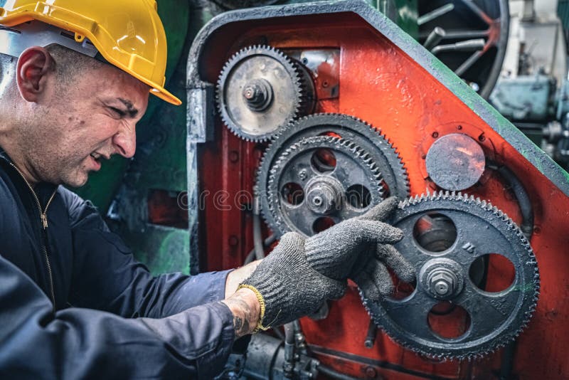 Factory Worker Got His Arm Stuck in the Machine. Stock Image - Image of ...