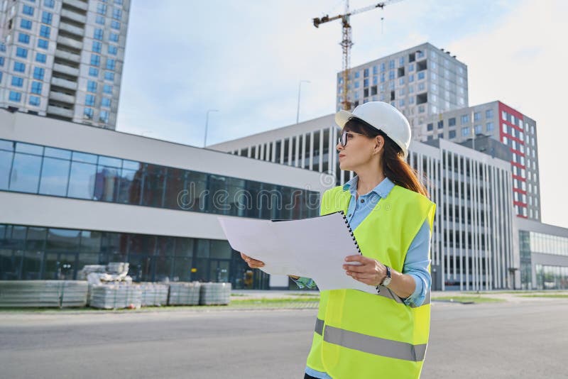 Industrial Worker Female Builder Working Documents Outdoor Construction ...