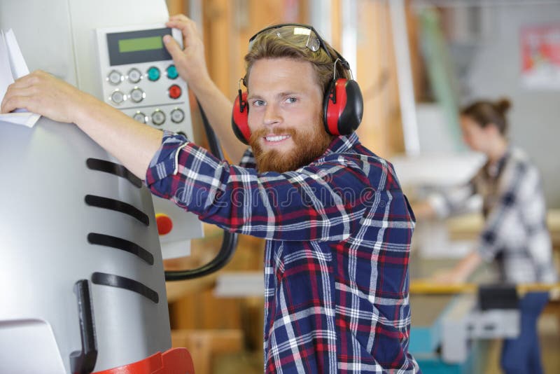 Industrial Worker Operates Machine Stock Image - Image of controller ...