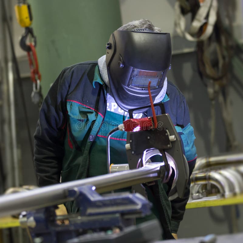 Industrial Worker Setting Orbital Welding Machine. Stock Photo - Image ...