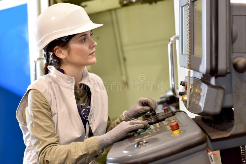 Industrial Worker Setting Up a Machine Stock Image - Image of ...