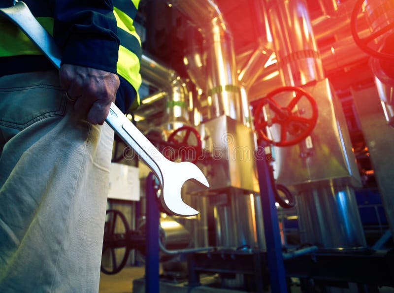 Industrial Worker with Spanner at Factory Workshop Stock Photo - Image ...