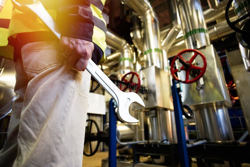 Industrial Worker with Spanner at Factory Workshop Stock Photo - Image ...