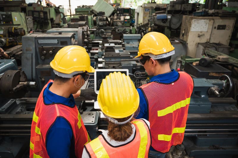 The Industrial Worker Team is Working on Various Projects in a Large ...