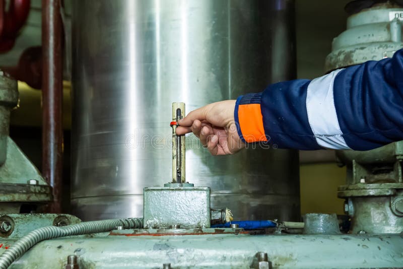 Industrial Worker Touching Tool at Work in Factory Stock Image - Image ...