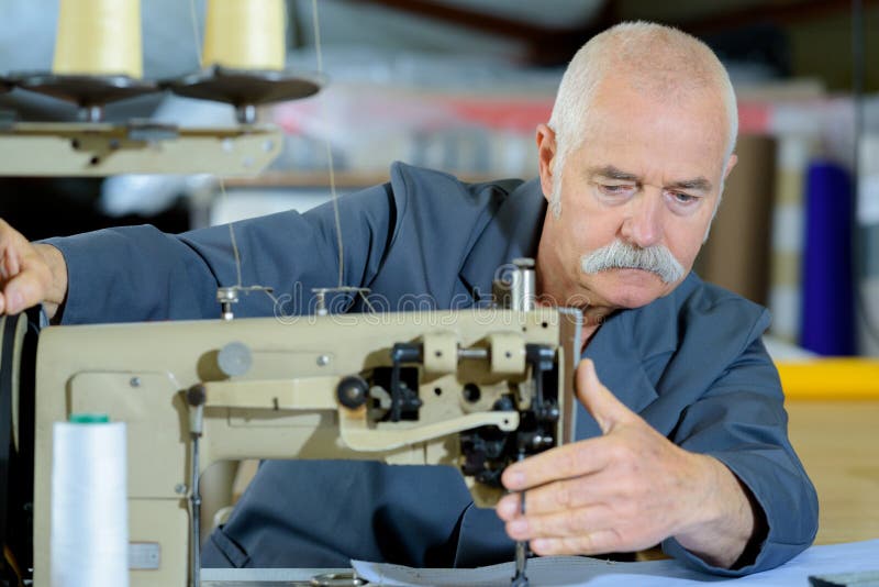 Industrial Worker Using Sewing Machine for Thicker Material Stock Image ...