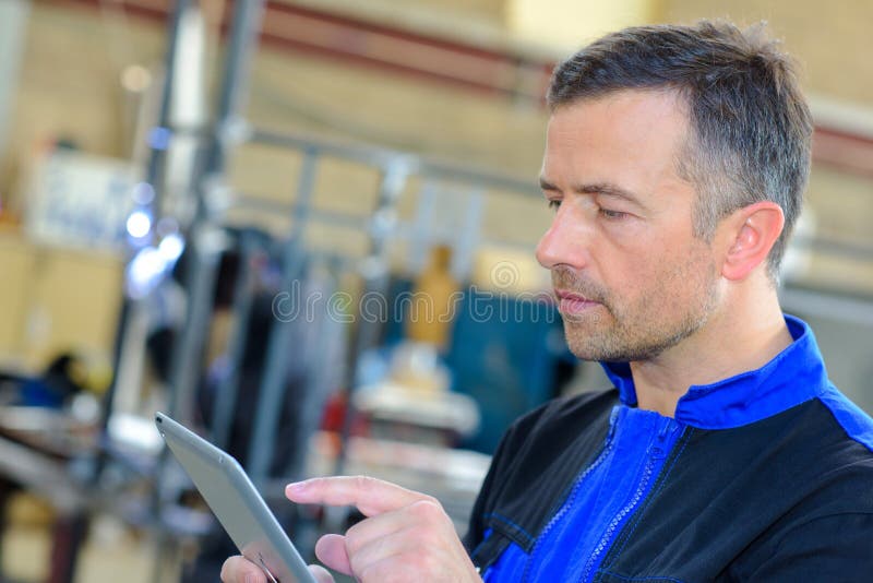 Industrial Worker Using Tablet Stock Photo - Image of device, engineer ...