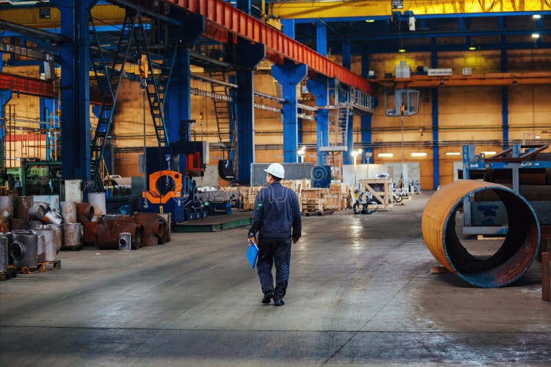 Industrial Worker Walking at Pipe Factory Stock Image - Image of ...