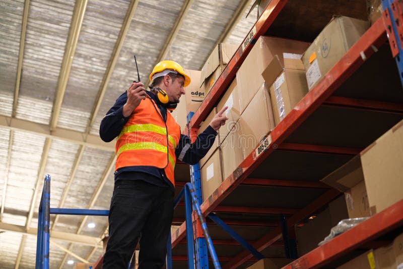 Industrial Worker Working at Warehose Factory Stock Photo - Image of ...