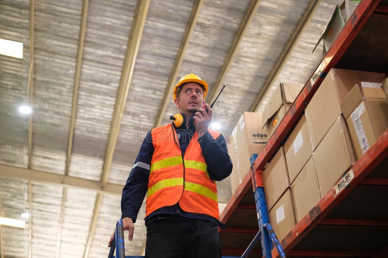 Industrial Worker Working at Warehose Factory Stock Photo - Image of ...