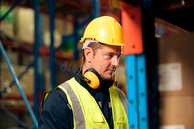 Industrial Worker Working at Warehose Factory Stock Photo - Image of ...