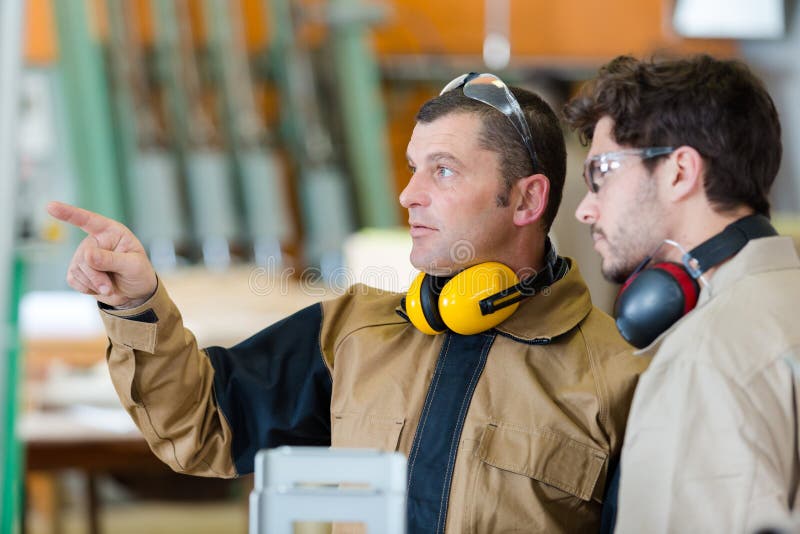 Two Workers in Factory on Machine Stock Photo - Image of operator ...