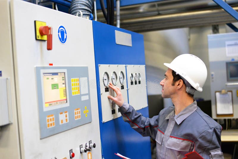 Industrial Workers Inspect the Technology of a Plant for Function ...