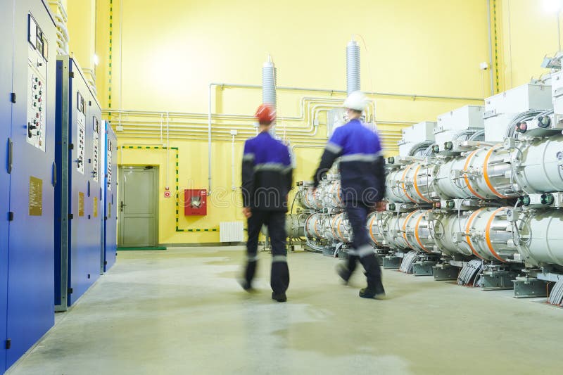 Industrial Technicians Walks at Power Energy Supply Factory Stock Photo ...