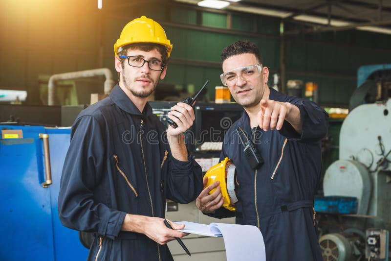 Industrial Workers are Working on Projects in Large Industrial Plants ...