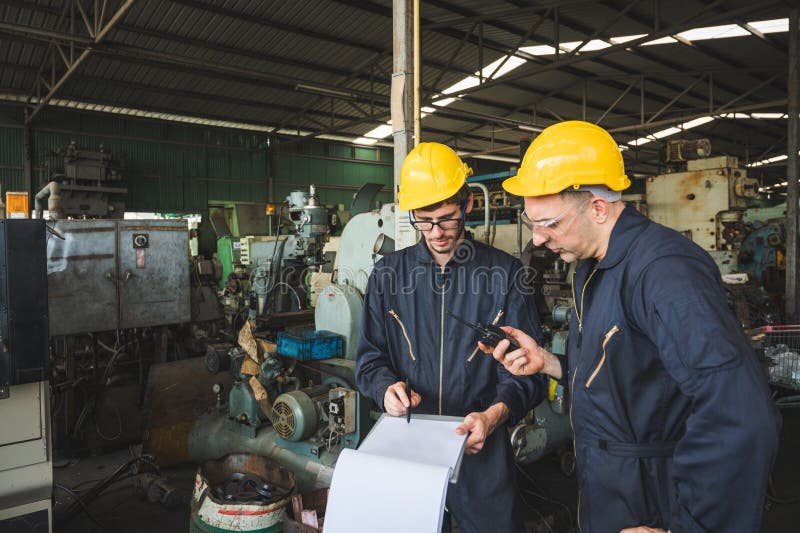 Industrial Workers are Working on Projects in Large Industrial Plants ...