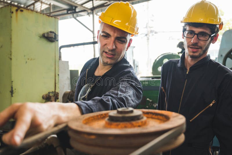 Industrial Workers are Working on Projects in Large Industrial Plants ...